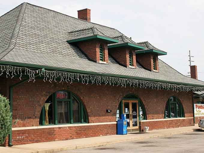 That classic depot architecture isn't just for show, it's your breakfast destination with actual railroad history baked in.