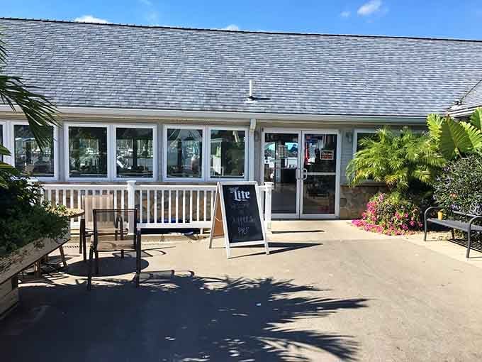 That inviting entrance with its chalkboard sign promises good times and even better seafood just steps away inside.