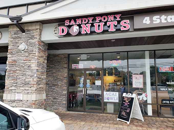 That pink and white sign isn't just calling you, it's practically singing a siren song of sweetness.