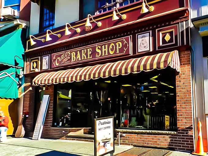 The storefront practically glows with promise, like a lighthouse guiding ships to safe harbor, except the harbor is filled with cannoli.