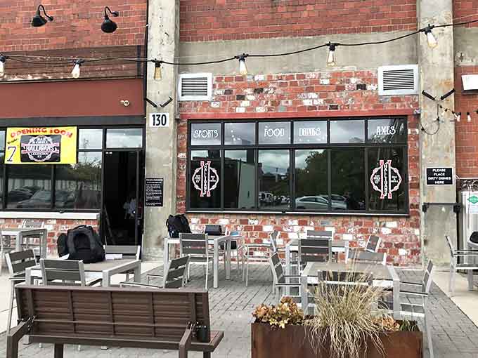 The outdoor patio proves that firefighter chic works just as well in the sunshine as it does inside the station.