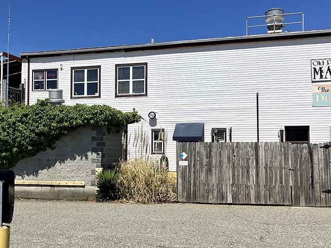 This weathered coastal charm proves the best seafood spots never need fancy facades to win hearts.