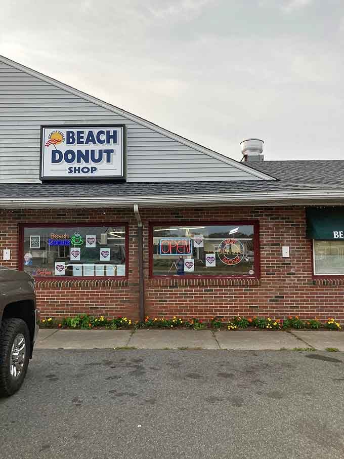 That cheerful sunshine logo isn't lying – pure happiness awaits behind those brick walls and neon signs.