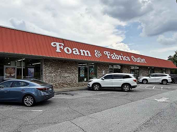 That distinctive red roof isn't just for show—it's basically a beacon calling all fabric enthusiasts to crafting paradise.