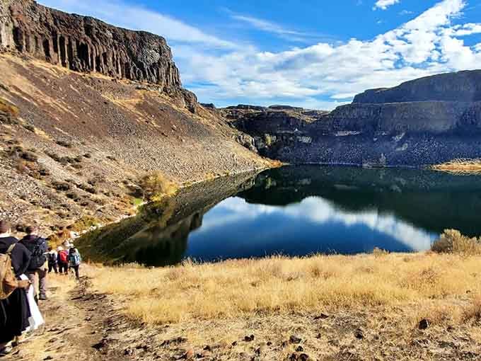 That mirror-perfect reflection isn't a postcard trick; it's just another Tuesday at Ancient Lakes being absolutely spectacular.