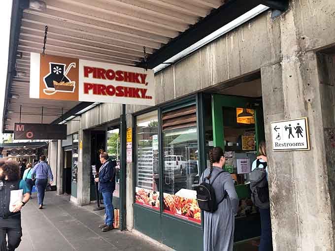 The green trim and bold red signage announce this Pike Place treasure louder than a fishmonger's morning call to customers.