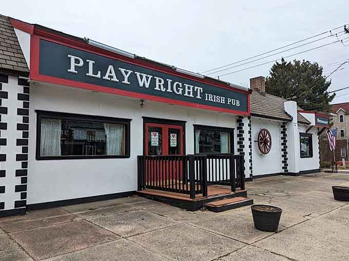 The classic black and white exterior with its welcoming porch practically begs you to come inside for a pint.