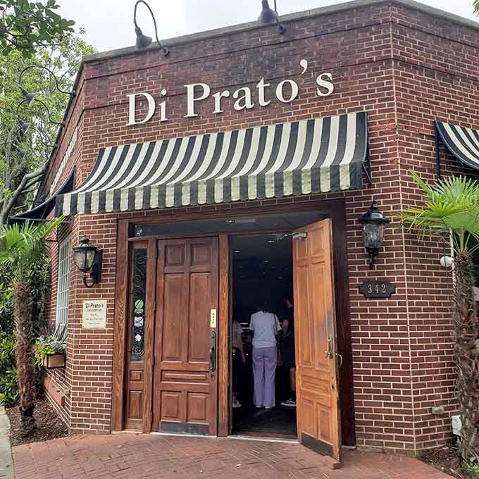 That classic brick facade with striped awnings isn't just charming, it's your beacon to pimento cheese paradise.