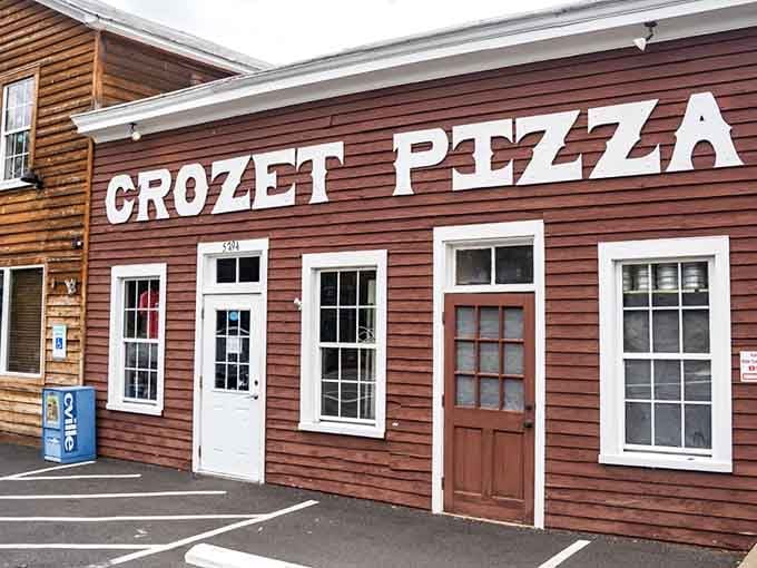 That rustic red exterior isn't trying to impress anyone, and that's exactly why it works so perfectly.