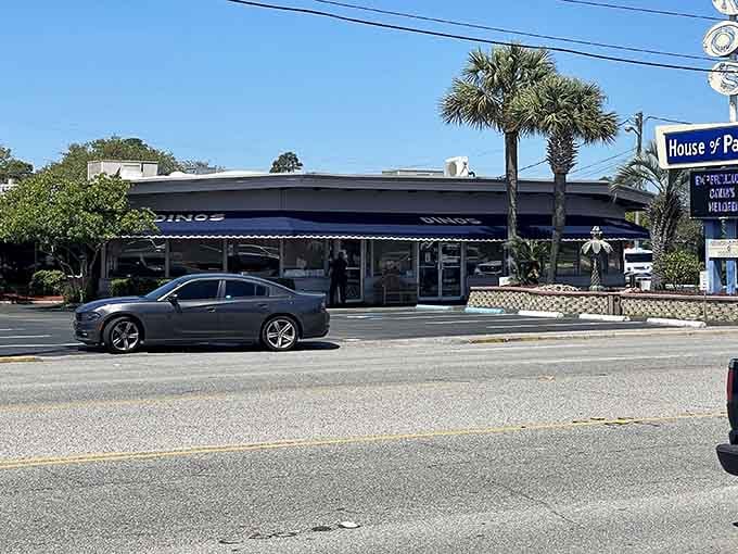 That blue awning has been calling hungry souls to breakfast bliss longer than most food trends have existed.