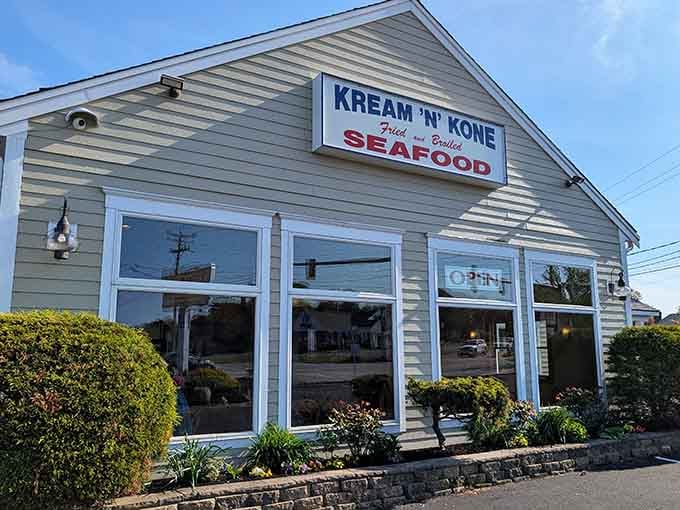 That classic Cape Cod architecture promises fried seafood dreams, and those big windows let everyone see the happiness inside.