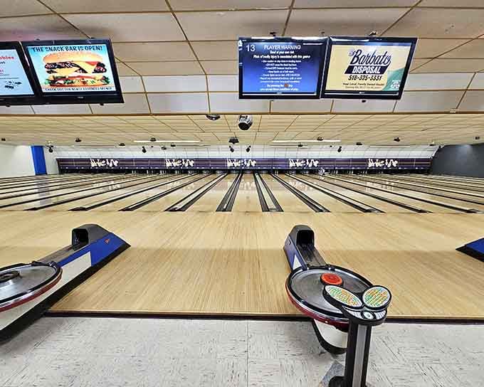 Those gleaming lanes stretch out like a promise of fun, waiting for you to make your mark.