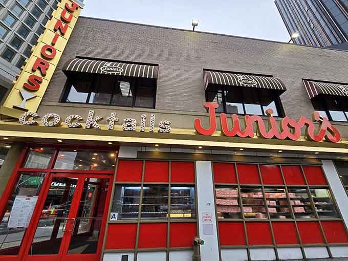 That bold red signage isn't just decoration, it's a beacon calling you to cheesecake paradise and diner glory.