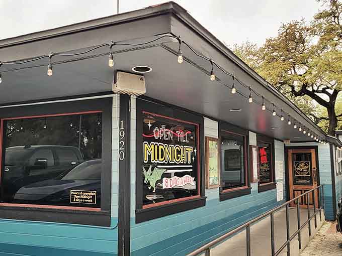 That turquoise exterior isn't just paint, it's a beacon calling hungry souls home at any hour.