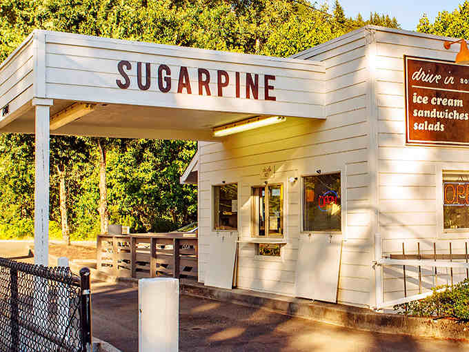 Classic drive-in architecture meets Pacific Northwest beauty in this postcard-perfect setting that never gets old.