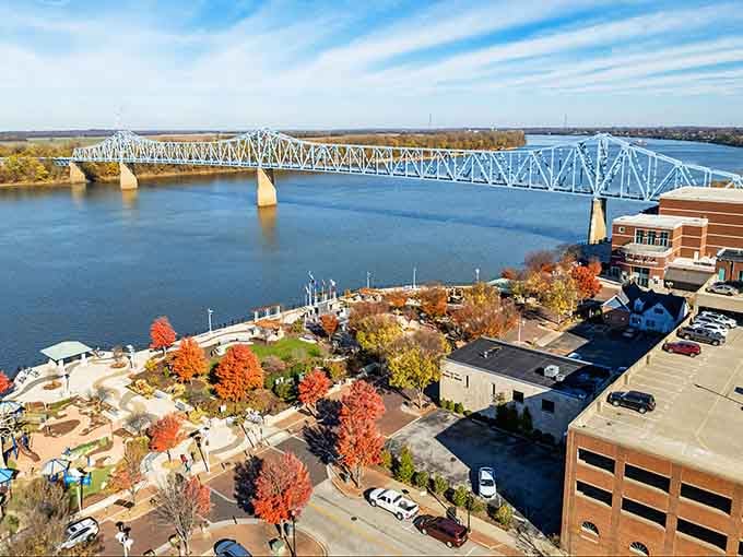 Fall colors frame the riverfront perfectly, proving nature doesn't charge admission for its best shows here.