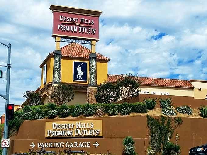 When even the parking garage sign looks this polished, you know you're entering serious shopping territory where wallets go to get lighter.