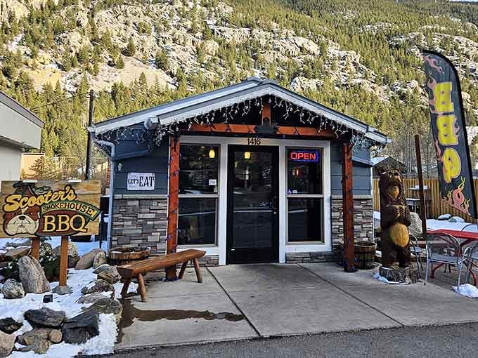 That wooden bear isn't just decoration, it's the bouncer making sure only serious barbecue lovers enter this mountain sanctuary.