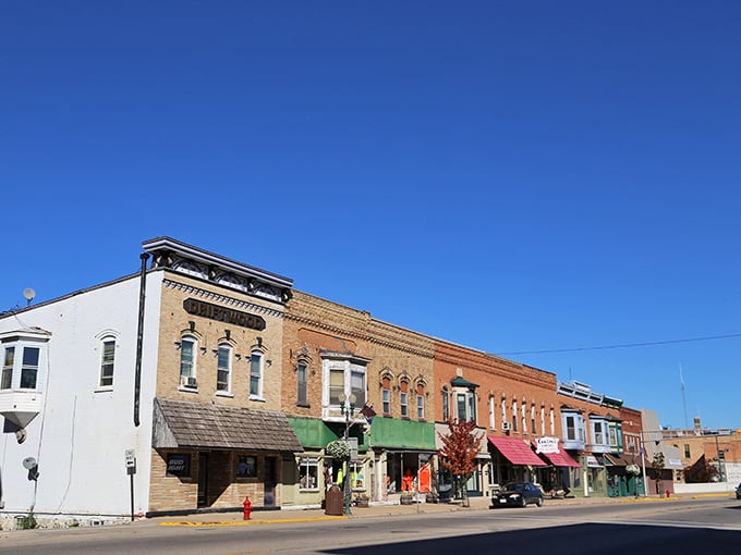 Classic storefronts lined up like they're posing for a postcard, and honestly, they're nailing it completely.