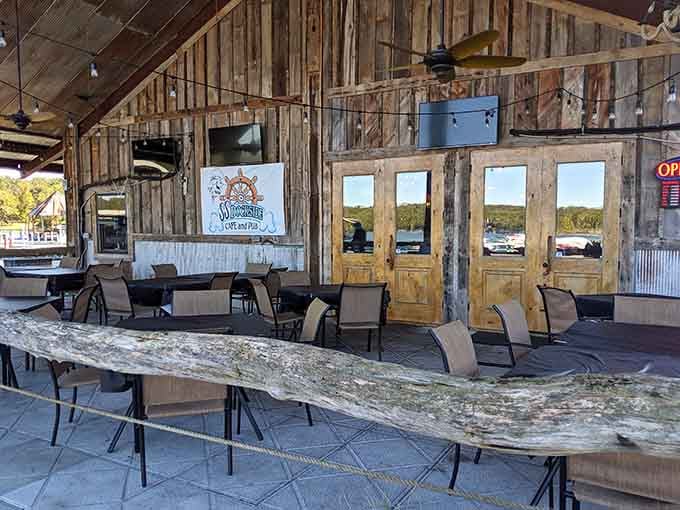That weathered wood and rope-lined deck tell you this place has earned its lakeside stripes through countless sunsets.