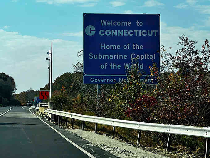 That blue sign hits different when you've been stuck in traffic since the Triassic Period.