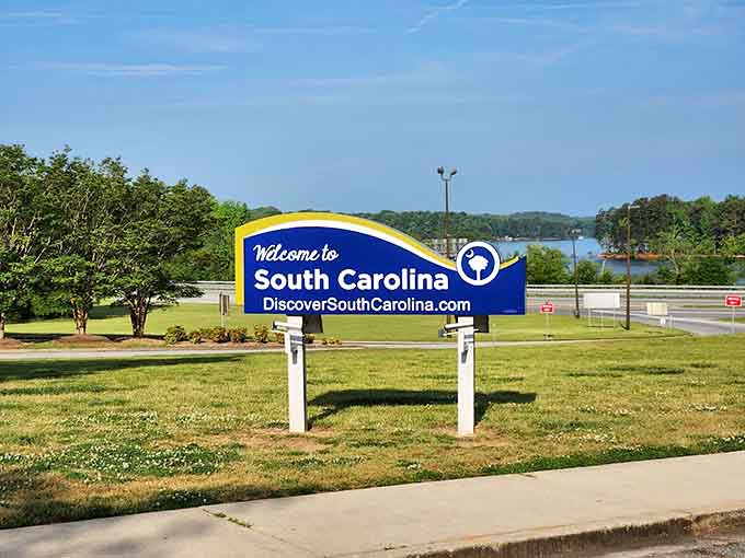 That blue sign isn't just marking a border&mdash;it's announcing your arrival at somewhere that actually feels like home.