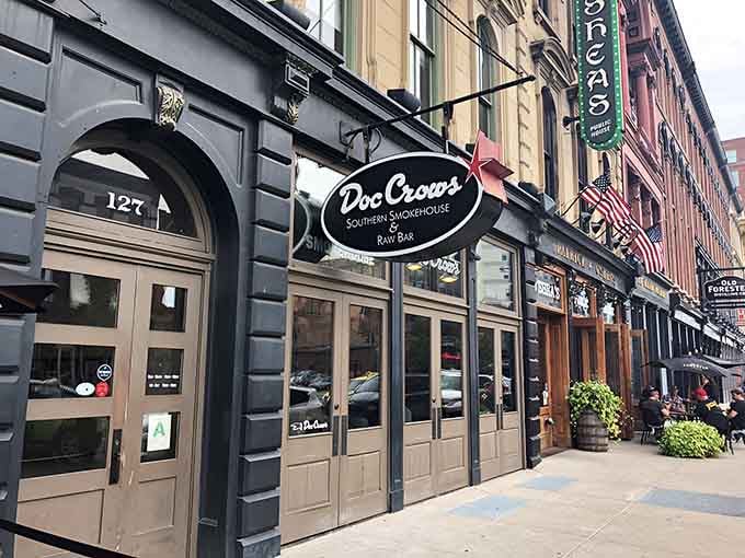 That classic oval sign hanging above Main Street is your beacon to barbecue bliss in a building with serious character.