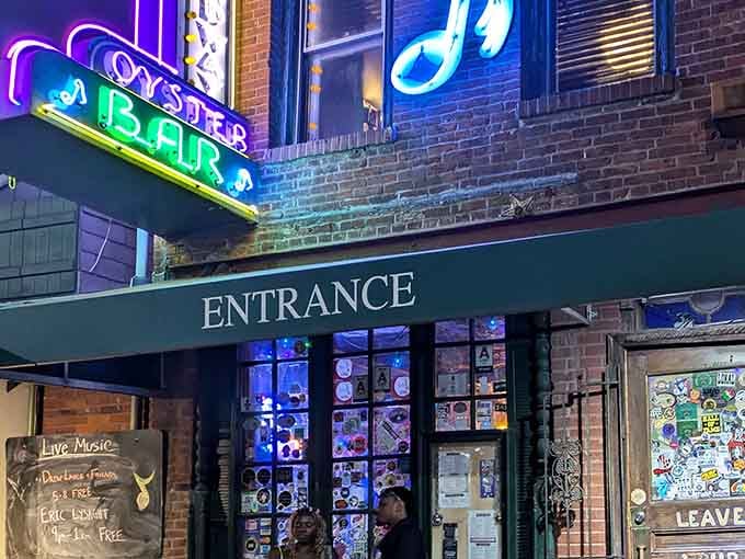 That neon glow isn't just calling you in, it's practically singing a Cajun lullaby from the street.