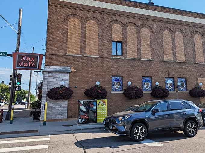 That classic brick facade and vintage sign tell you everything: this place has stories to share over dinner.