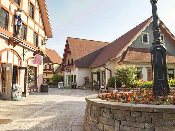 Stone planters and manicured gardens frame the Bavarian streetscape, where every corner feels like a scene from The Sound of Music.
