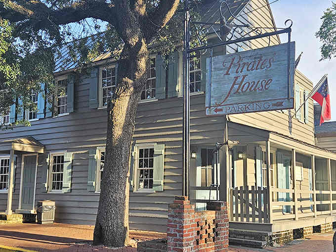 That weathered clapboard facade has witnessed more history than most museums, standing proud since colonial sailors first stumbled ashore.