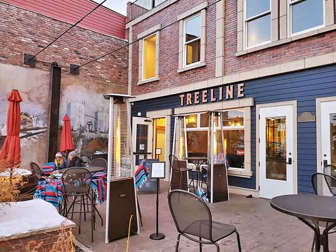 That blue facade and outdoor patio practically beg you to pull up a chair and stay awhile in mountain town magic.