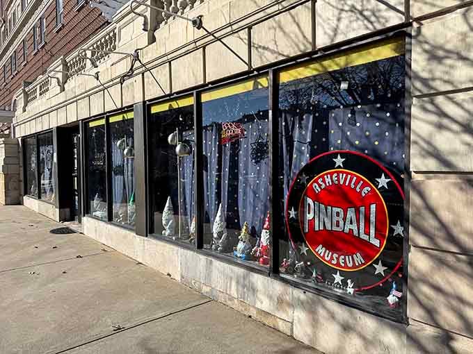 Downtown Asheville hides this treasure behind windows that promise pure mechanical joy and endless entertainment inside.