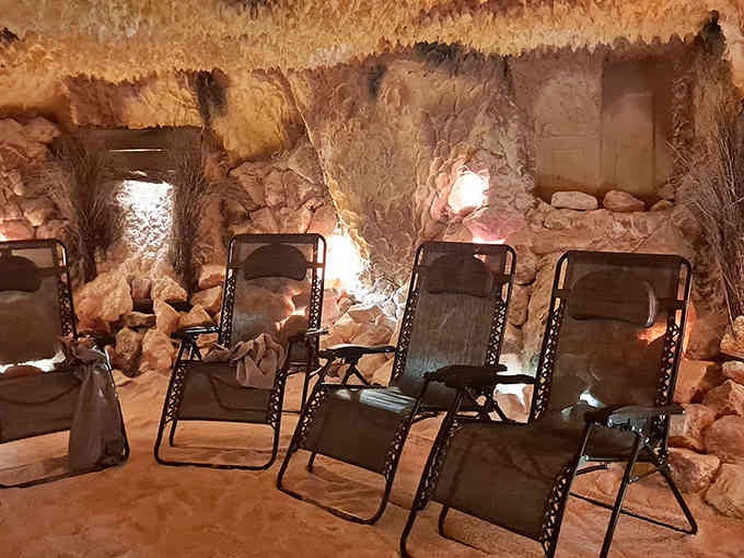 Zero-gravity chairs positioned perfectly in this therapeutic grotto make relaxation feel like a professional sport you're winning.