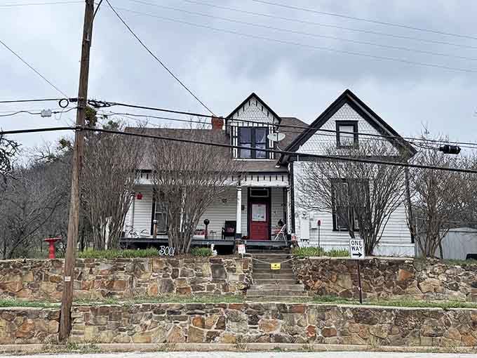 The stone retaining wall and steep steps leading up make you wonder if they're keeping something in or keeping you out.