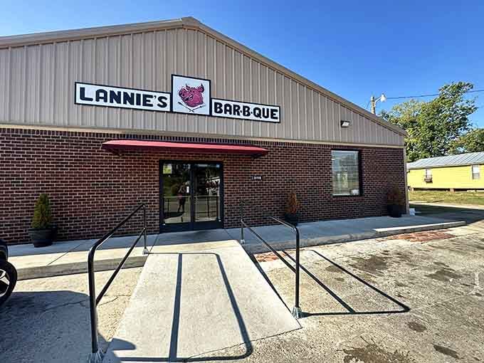The sign says it all, and that entrance has welcomed more barbecue pilgrims than you can count.