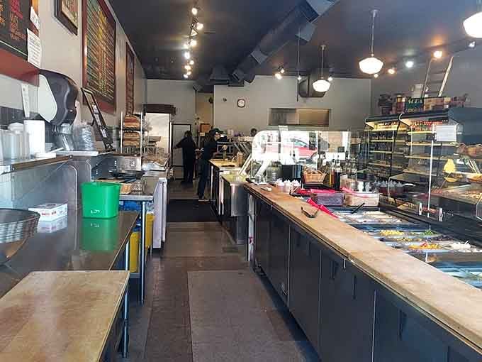 The long counter stretches before you like a delicious assembly line, where sandwich dreams become mouthwatering reality in minutes.