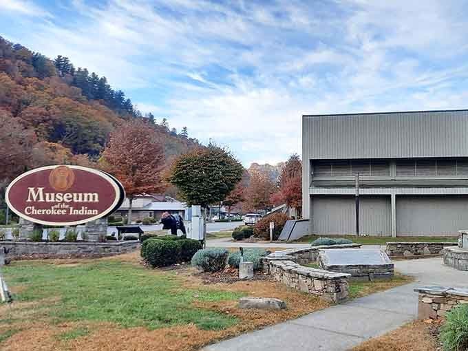 That welcoming sign against the autumn mountains tells you you're about to step into something special and significant.