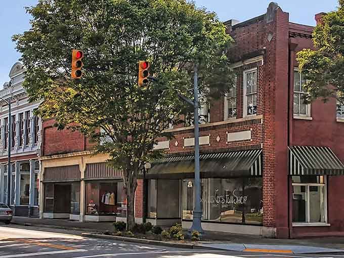 Main Street's brick storefronts wear their age like a badge of honor, complete with striped awnings that practically beg for a leisurely stroll.