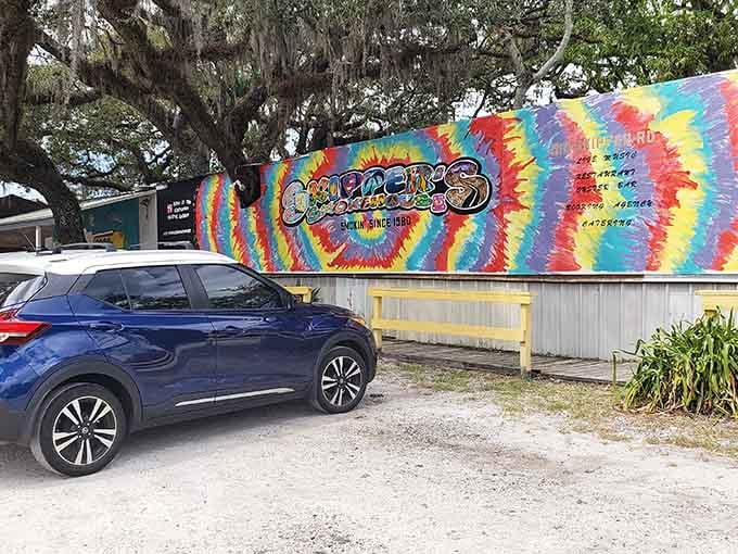 That tie-dye mural isn't just art; it's your first clue that something wonderfully different awaits inside.