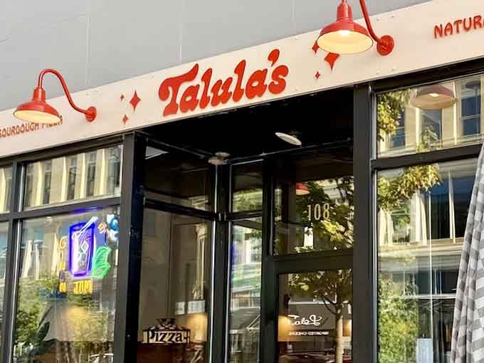 That red awning beckons like a lighthouse for hungry souls seeking sourdough salvation in Asbury Park.