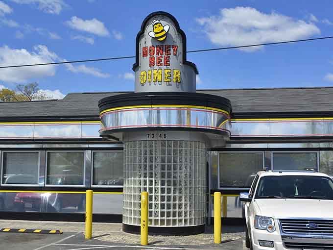 That gleaming chrome tower isn't just architecture, it's a beacon calling hungry travelers home to breakfast.
