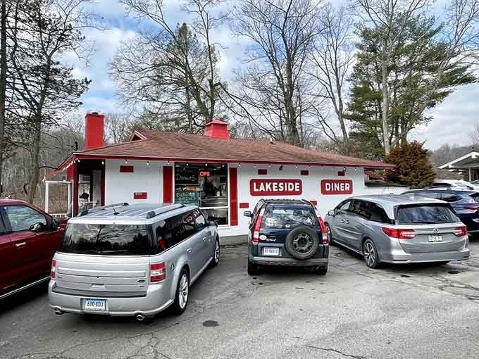 That red-trimmed exterior and packed parking lot tell you everything you need to know about what's waiting inside.