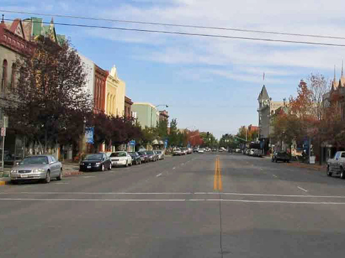 Wide streets built for wagon trains now handle SUVs, proving good urban planning never goes out of style.