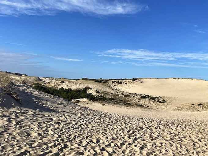 That brilliant turquoise sky against white sand makes you question your geography teacher's entire curriculum.