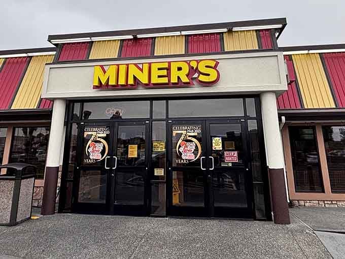 That cheerful striped awning beckons like a beacon of burger bliss in the Yakima landscape.
