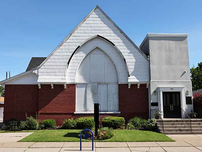 The Iron Island Museum stands proud on Lovejoy Street, its Gothic arched entrance hinting at the stories within.