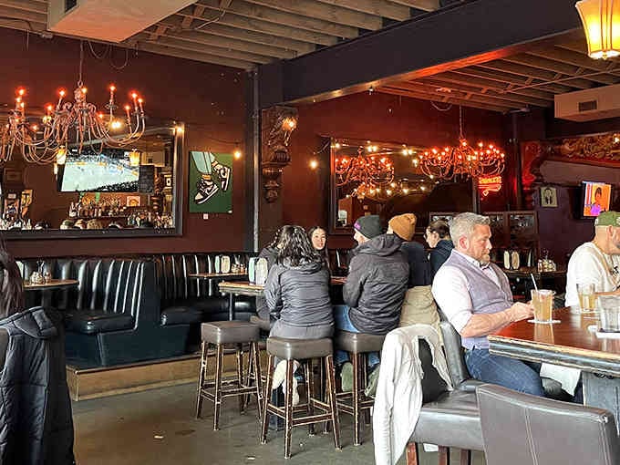 Talarico's Pizzeria West Seattle welcomes you with chandeliers and charm, where industrial meets Italian in perfect harmony.