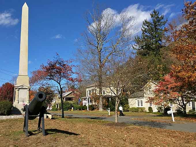 That monument and cannon tell stories your history teacher never mentioned, standing proud on the town green.