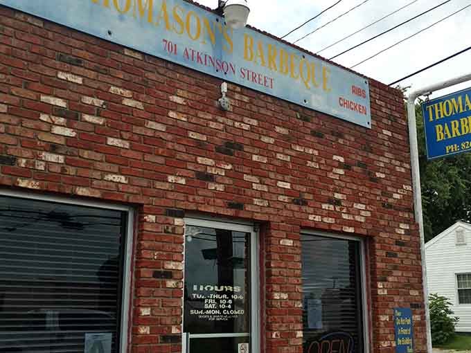 That brick facade has witnessed more barbecue pilgrimages than most churches have seen Sunday services.